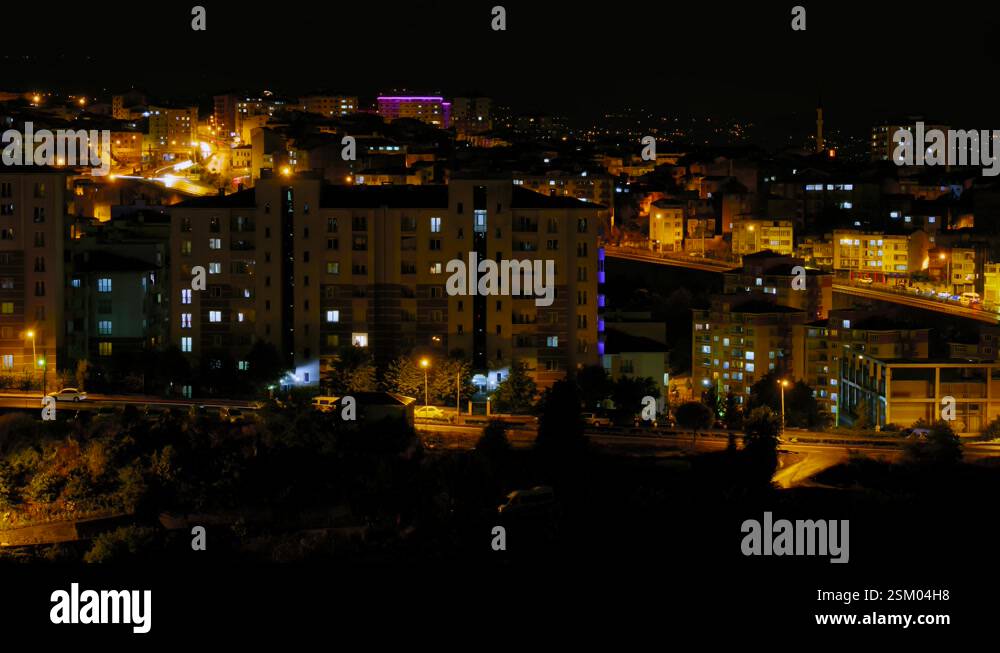 Timelapse: residential buildings with blinking windows, fast moving ...