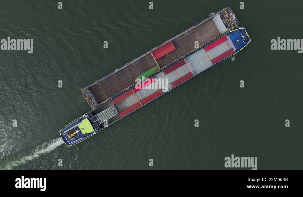 H2 Barge flying under the flag of the Netherlands sailing on the Oude ...