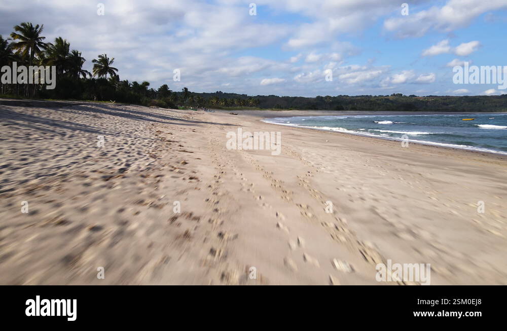 Foot Marks Over White Sand Beach Of Pantai Watu Bella In West Sumba ...