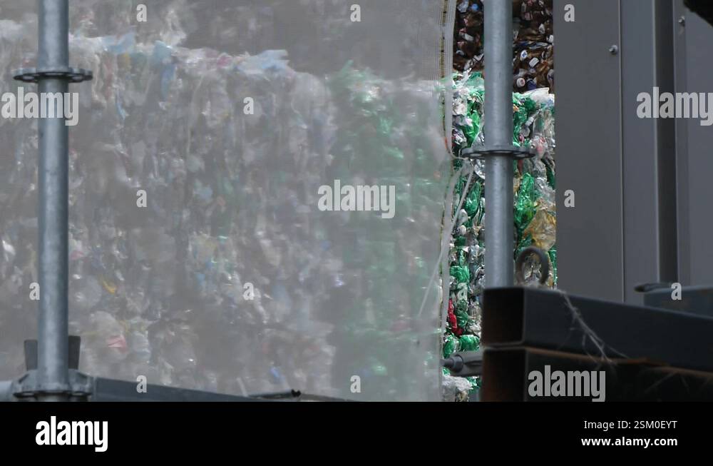 Deposit of compressed bottles cubes in the recycling company Stock ...