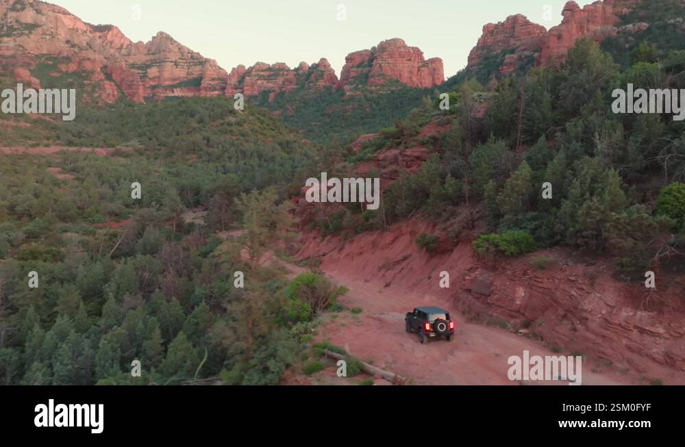 Four-wheel Drive Compact SUV Driving Through Rough Road To The Sedona ...