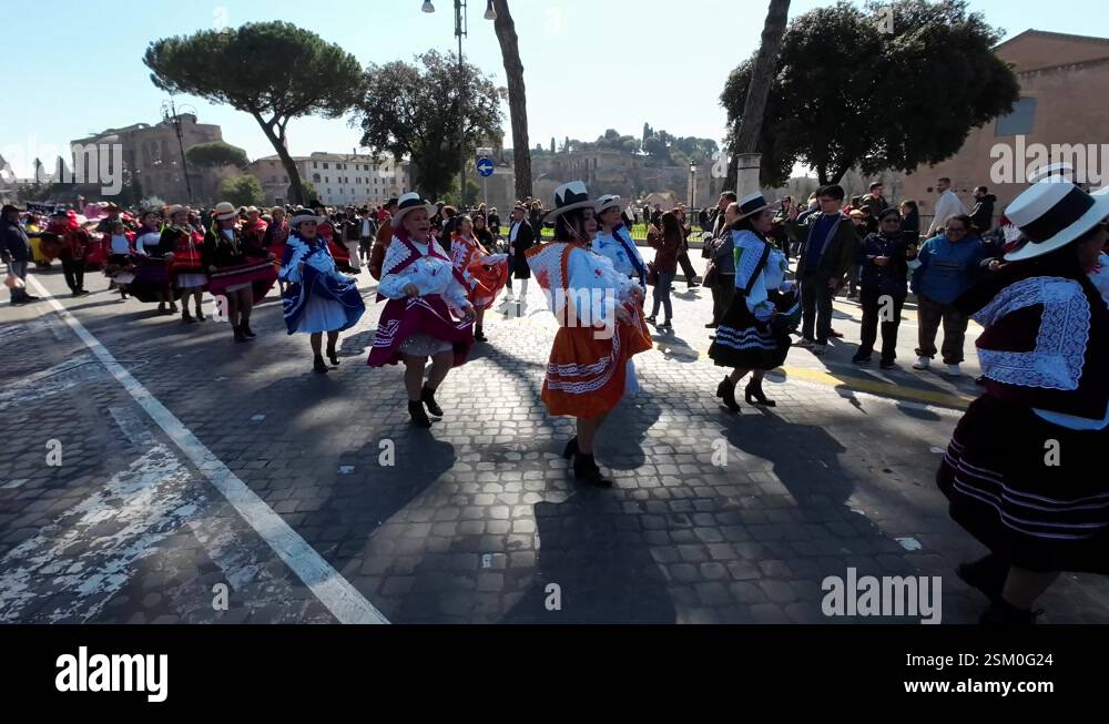 Peruvian women dancing with traditional polleras on during a Latin ...