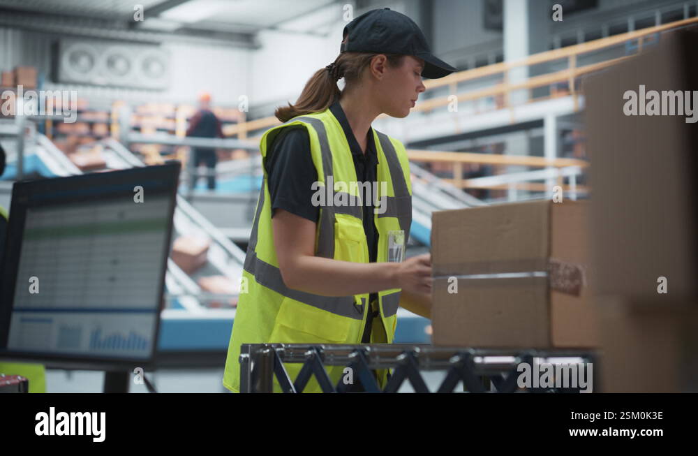 Woman Sorting Boxes In Distribution Warehouse Slow Motion Stock Video ...