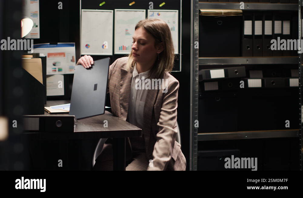 Investigating clues in evidence room Stock Video Footage - Alamy