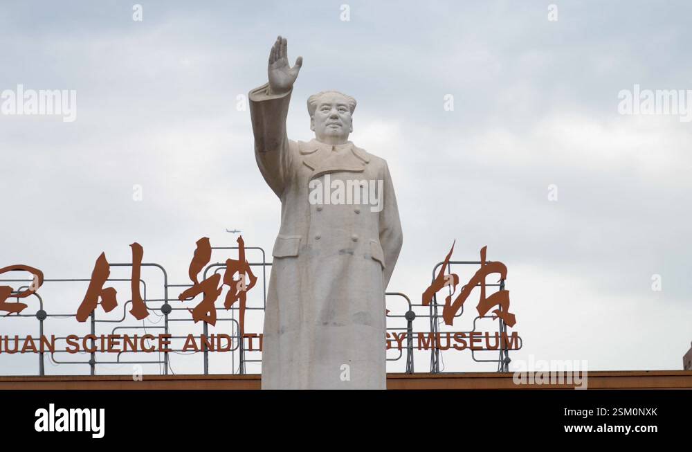 Still shot of Mao Zedong President statue with background title of ...