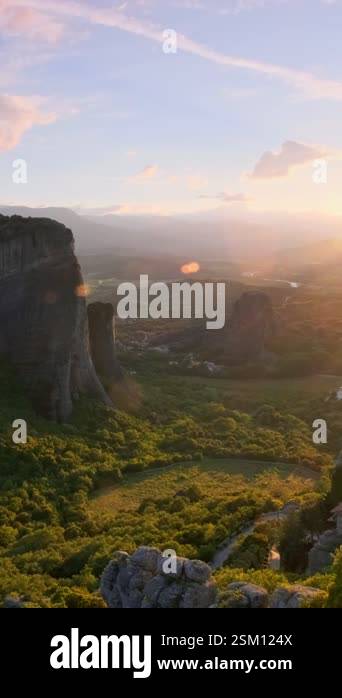 Sunset over monastery of Rousanou and Monastery of St. Nicholas ...