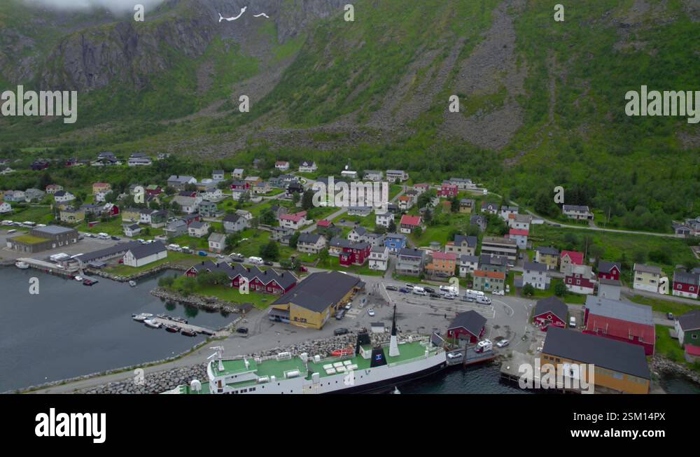 Norwegian ferry boarding cars at the port of Gryllefjord on Senja ...