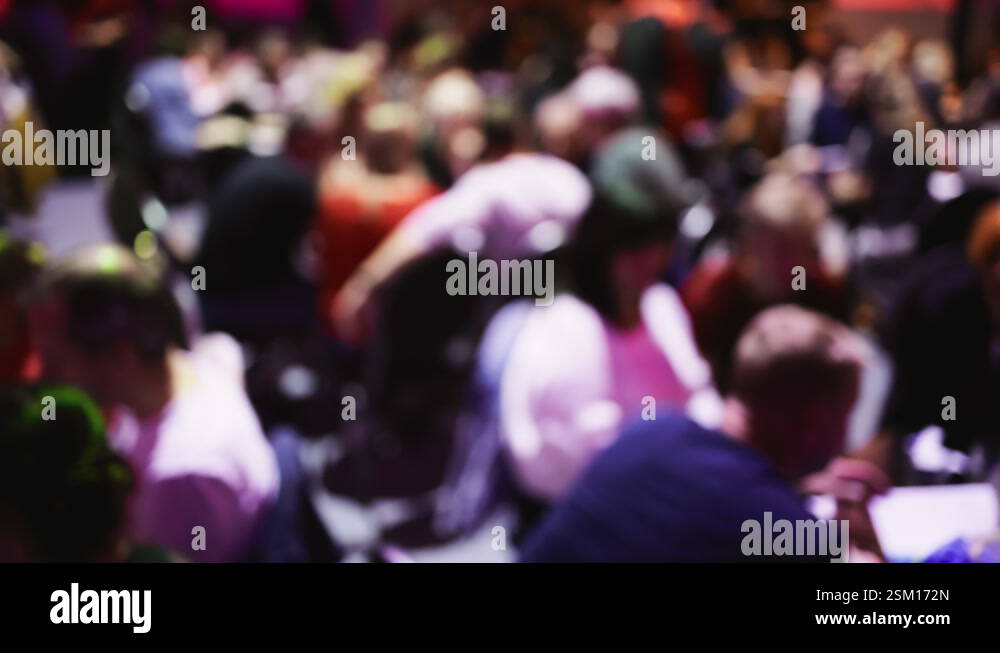 Enjoying a night out: Friends gather in a bar for fun and conversation ...