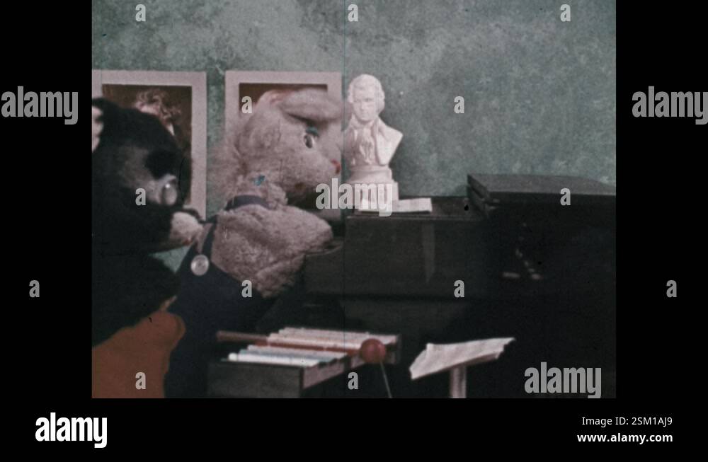 1970s: Dog and bear puppet talk and play grand piano. Mouse, cat and ...