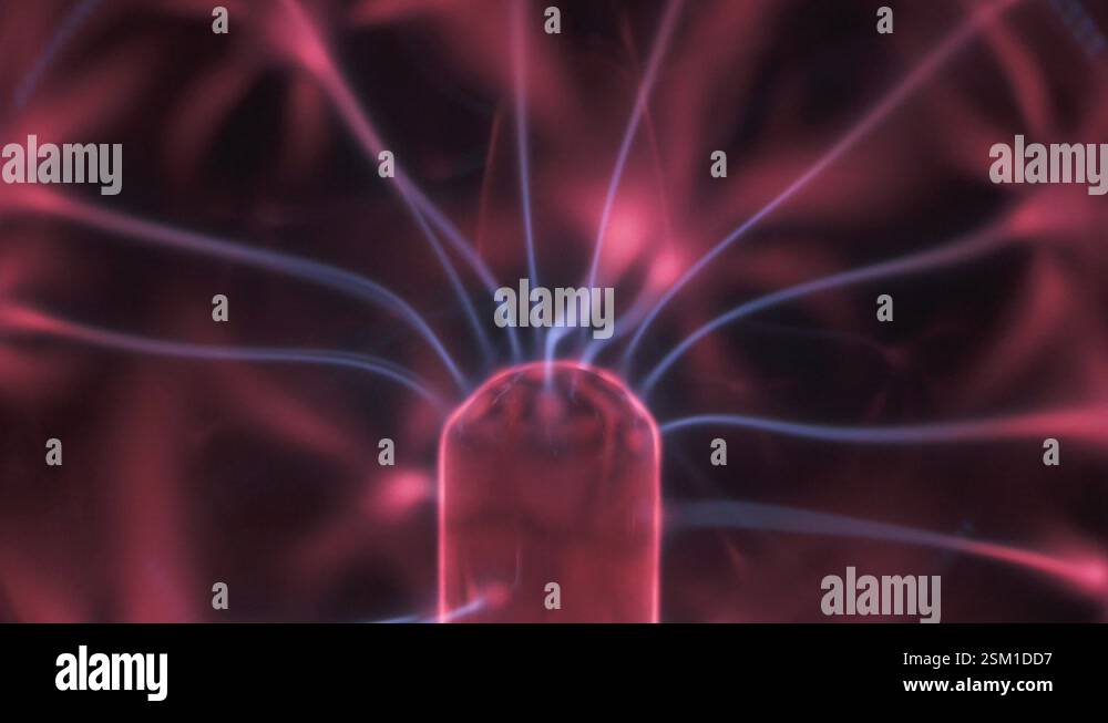 Plasma ball. Electric discharge in nitrogen helium gas mixture inside ...