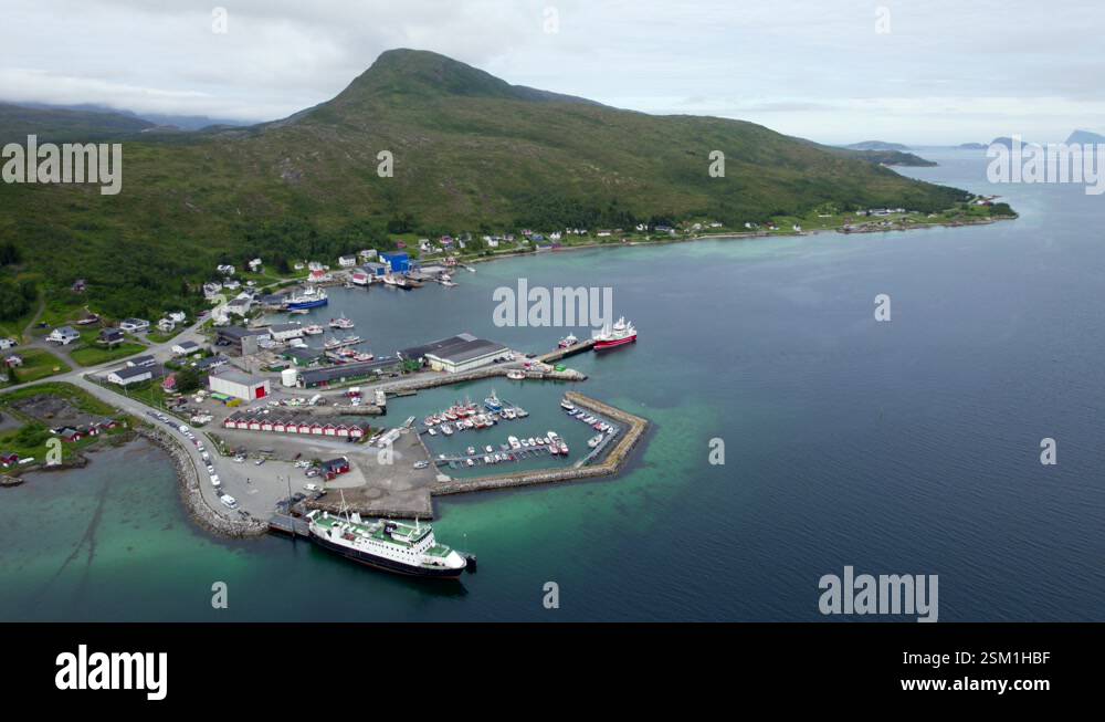 Flying backwards over the ferry port at Botnhamn on Senja Stock Video ...