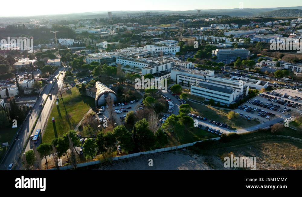 Montpellier's urban grid juxtaposed against nature, captured in an ...