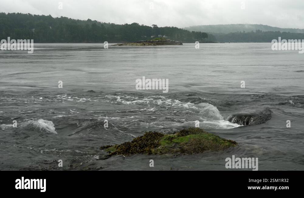 Real time of water flowing due to tidal imbalance up into reversing ...