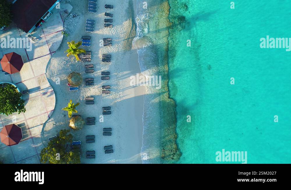 Top down static aerial of ocean waves crashing on Grote Knip Curacao ...