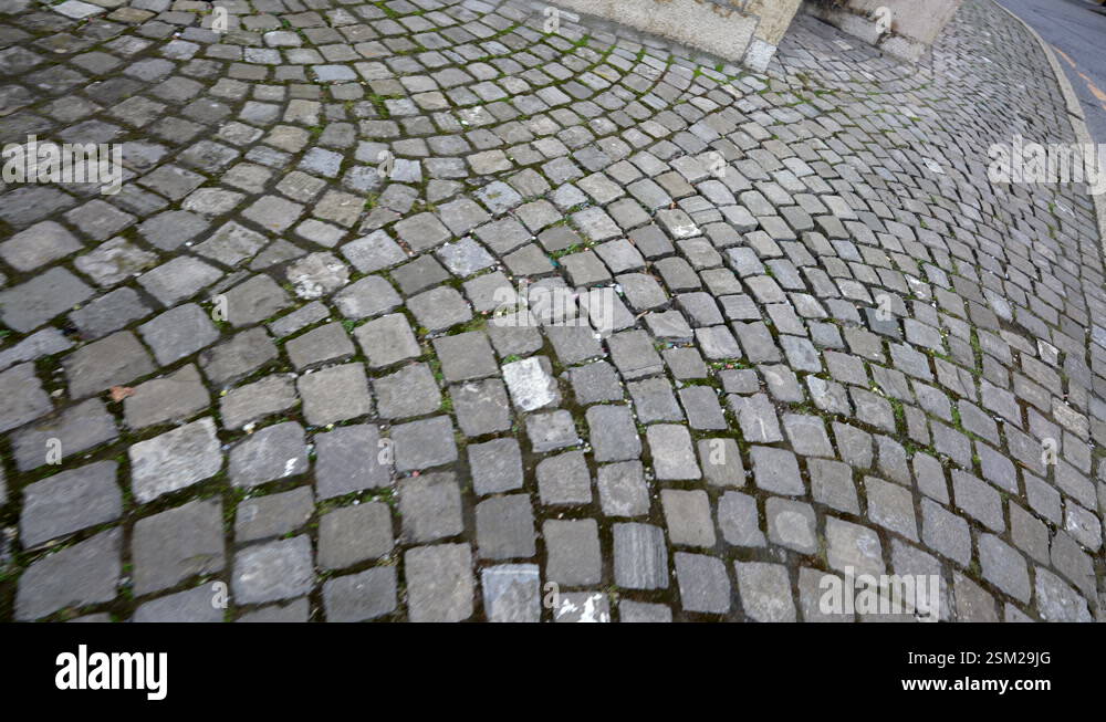 Ancient old cobblestone walkway POV of person walking in European ...