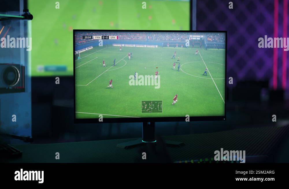 Gamer using digital football players to score an acrobatic goal in mock ...