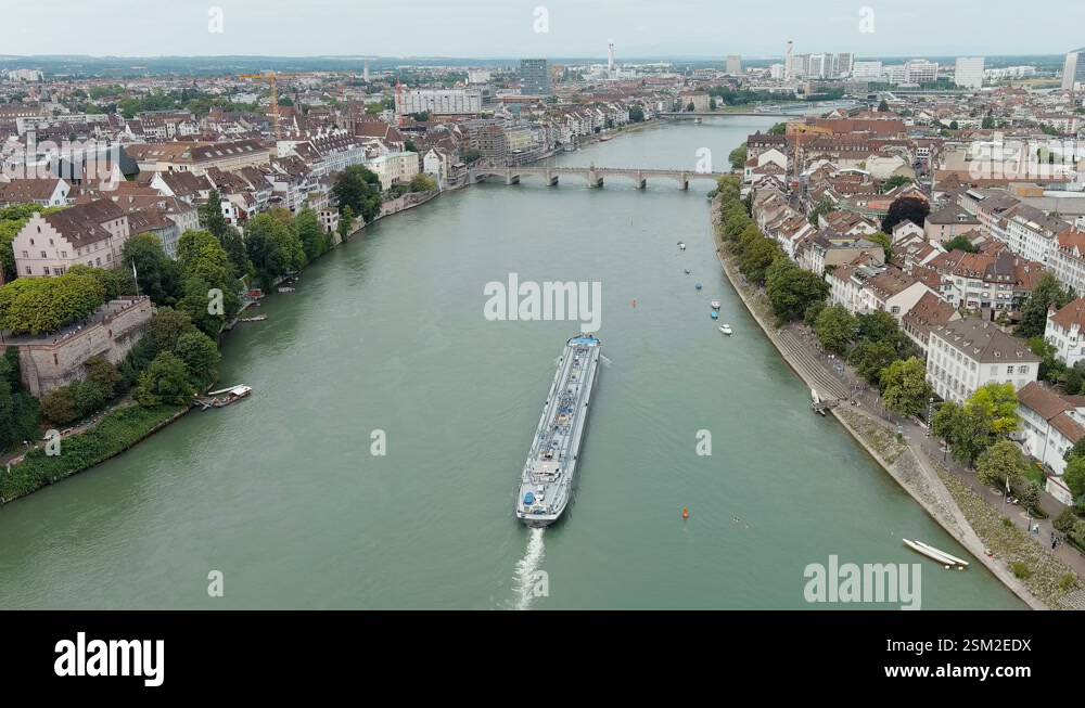 Basel, Switzerland. A tanker cargo barge floats along the Rhine River ...