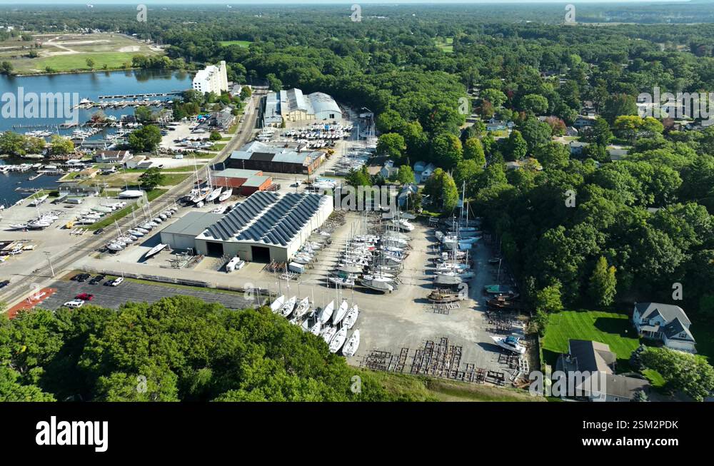 Various harbor buildings for sailboat storage, repair, and maintenance ...