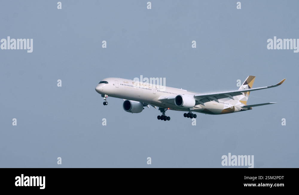 An Etihad Airways, Airbus A350 with wheels down making a landing at ...