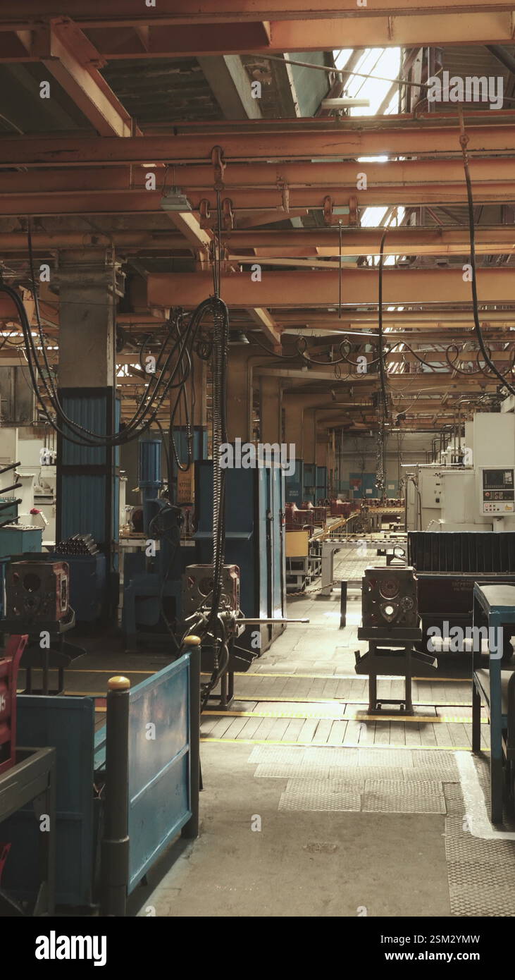 Large empty factory workshop with conveyor and machines Stock Video ...