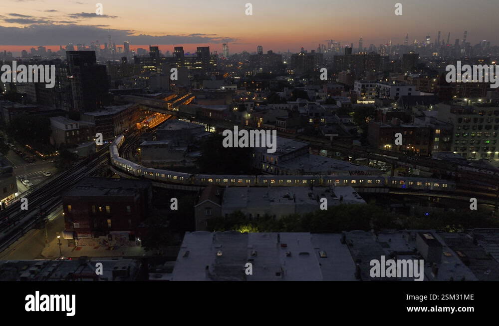Aerial view of the subway passing through Brooklyn at night Stock Video ...