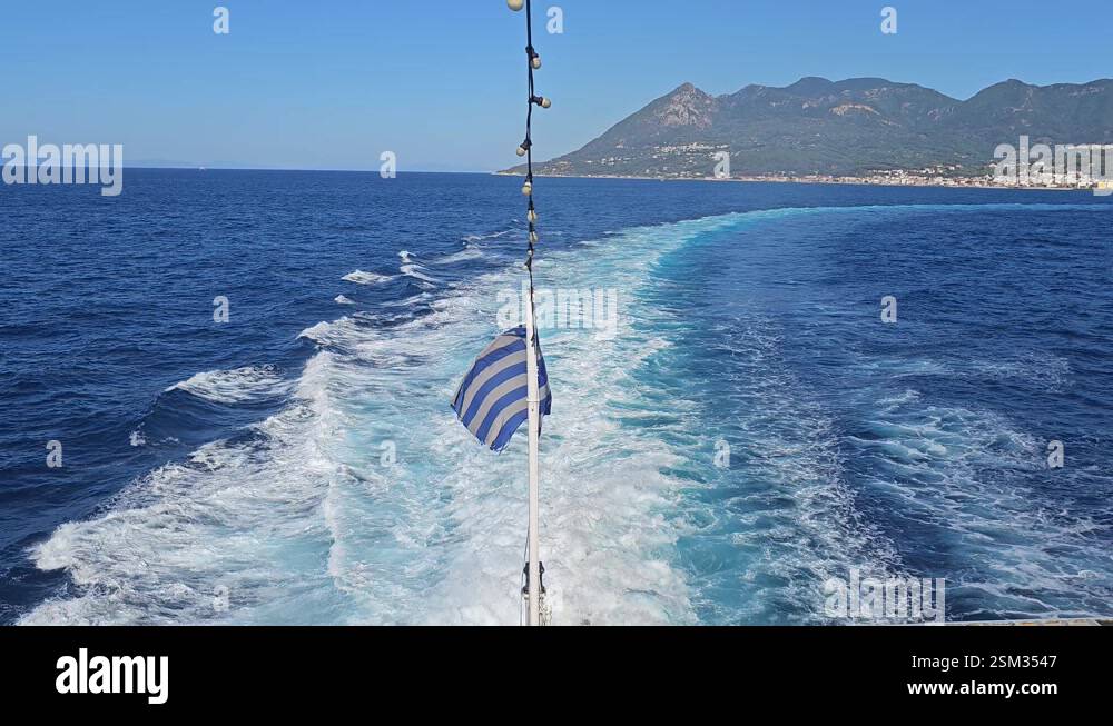 Greek flag on a boat in the Aegean sea Stock Video Footage - Alamy