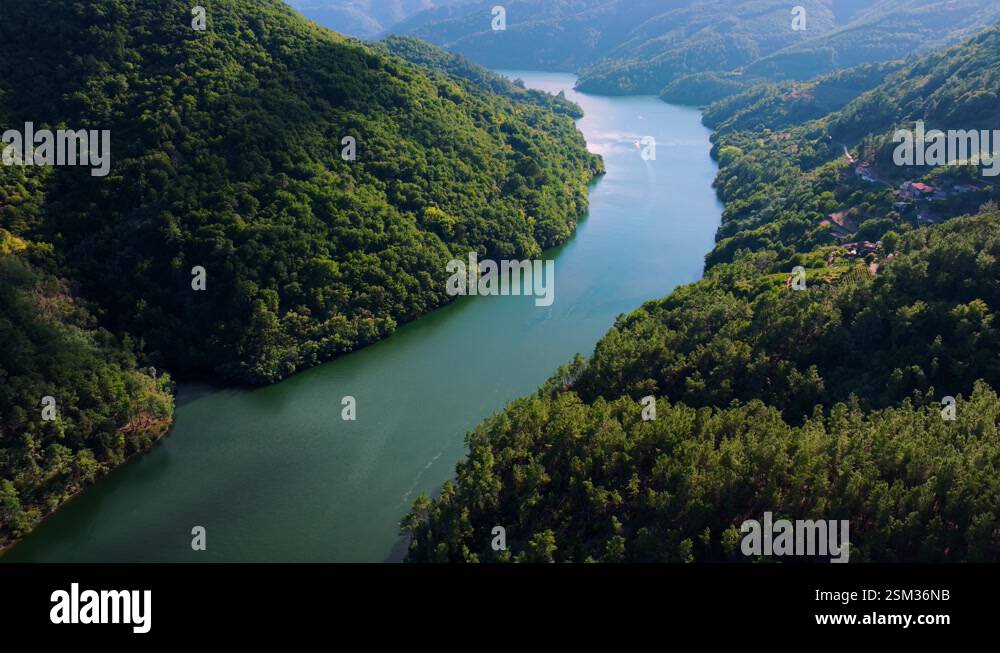 Minho River Along The Lush Green Mountains In Lugo, Spain. - aerial ...