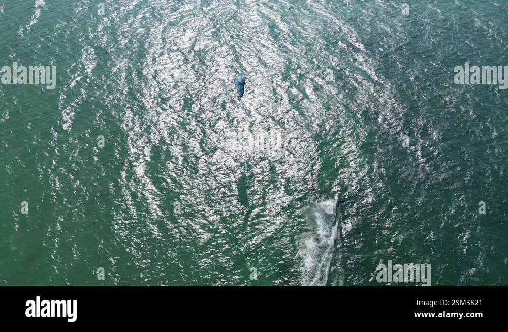 Overhead birds eye drone aerial view Kite surfer aerial Stock Video ...