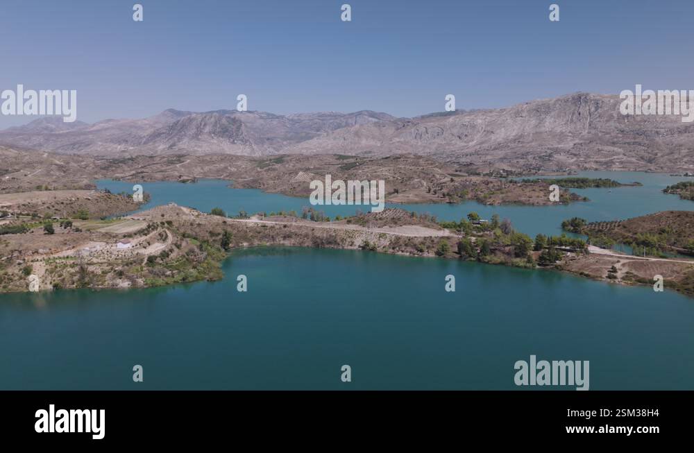 Flying across stunning turquoise waters of Green lake in the Taurus ...