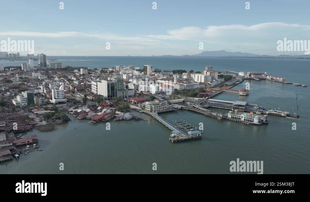 Aerial pans across ferry terminals at George Town, Penang, Malaysia ...