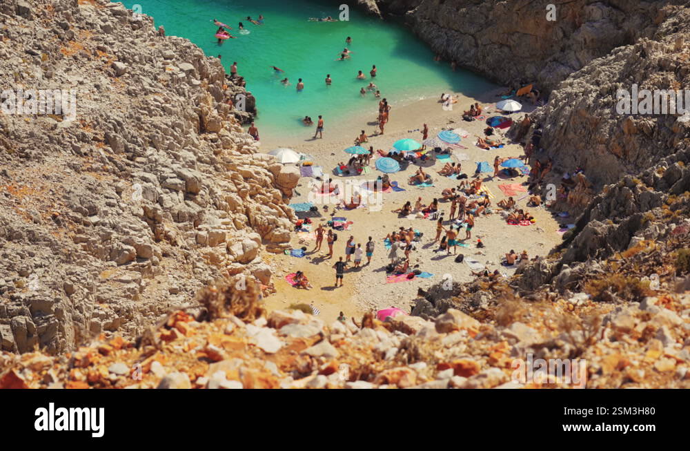 Magical view above Seitan Limania beach with tourists enjoying their ...