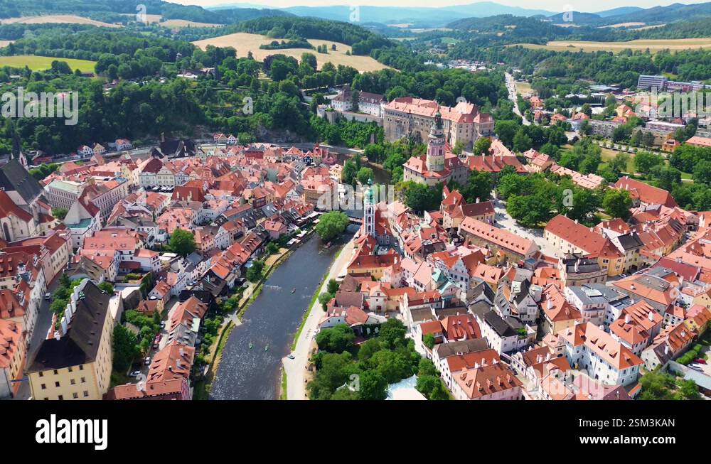 a view from above of the historic city center with an ancient castle ...