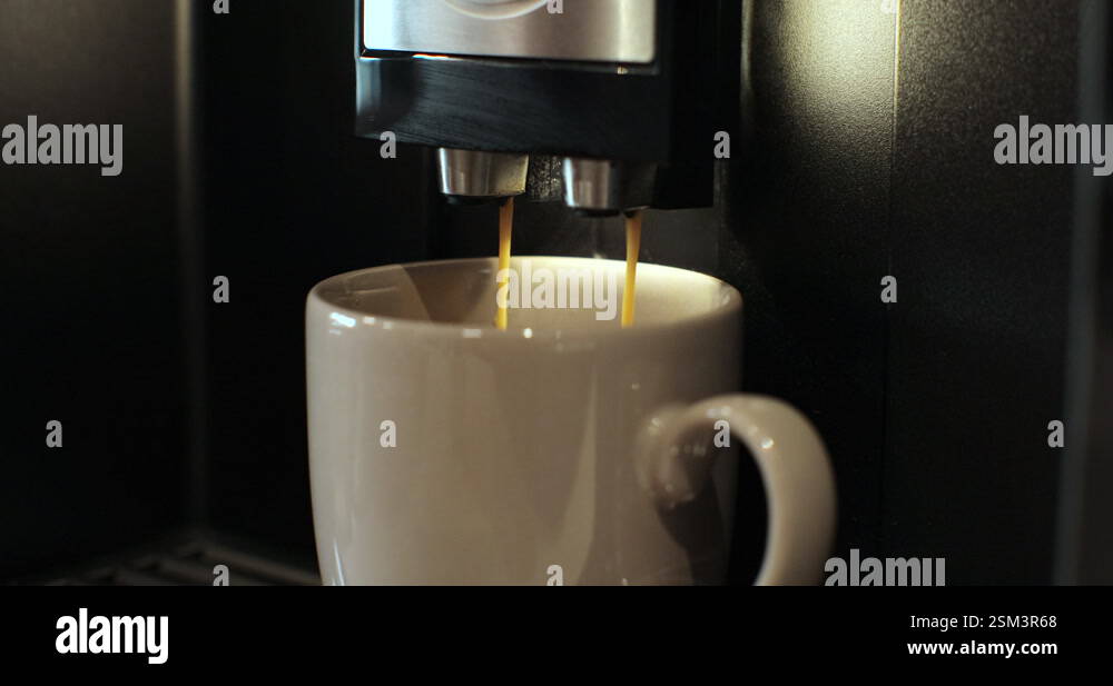 Coffee machine making americano. Coffee dropping in cup. Preparation ...