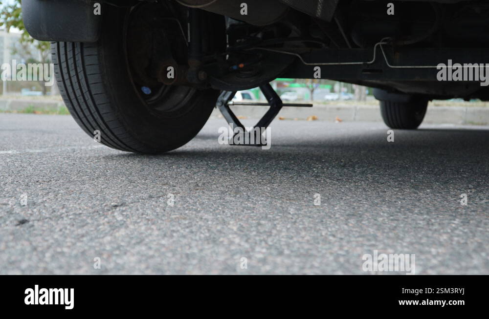 Replacing damaged car wheel Stock Videos & Footage - HD and 4K Video ...