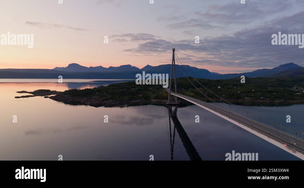 Sunset drone flight next to iconic Halogaland bridge in Narvik, Norway ...