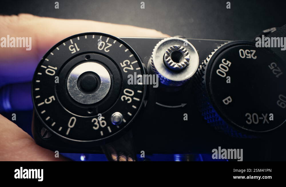 Settings mechanism on mirror analog film camera. Rotation,using ...