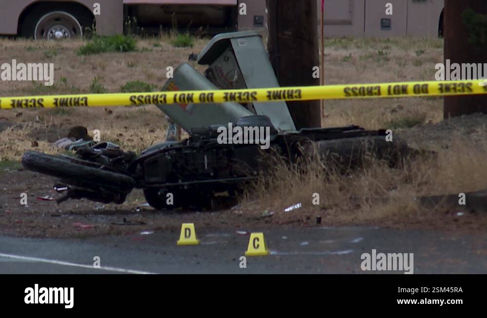 AFTERMATH OF MOTORCYCLE CRASH BEHIND POLICE TAPE Stock Video Footage ...