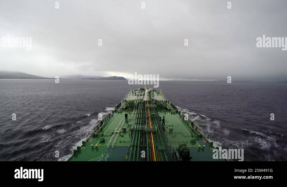Timelapse oil tanker transit crossing Strait of Magellan Punta arenas ...
