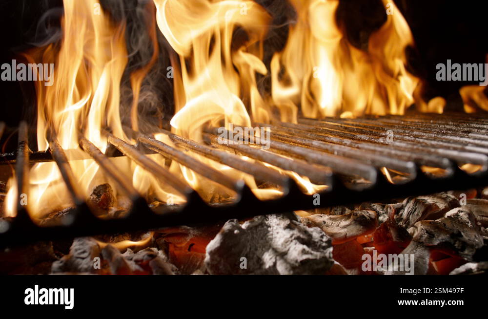Empty hot barbecue grill ready to use,The fire burns through the grill ...