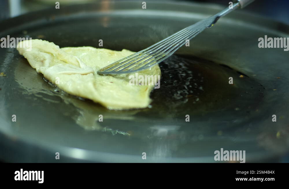Roti Making, roti thresh flour by roti maker with oil. Thai Street Food ...