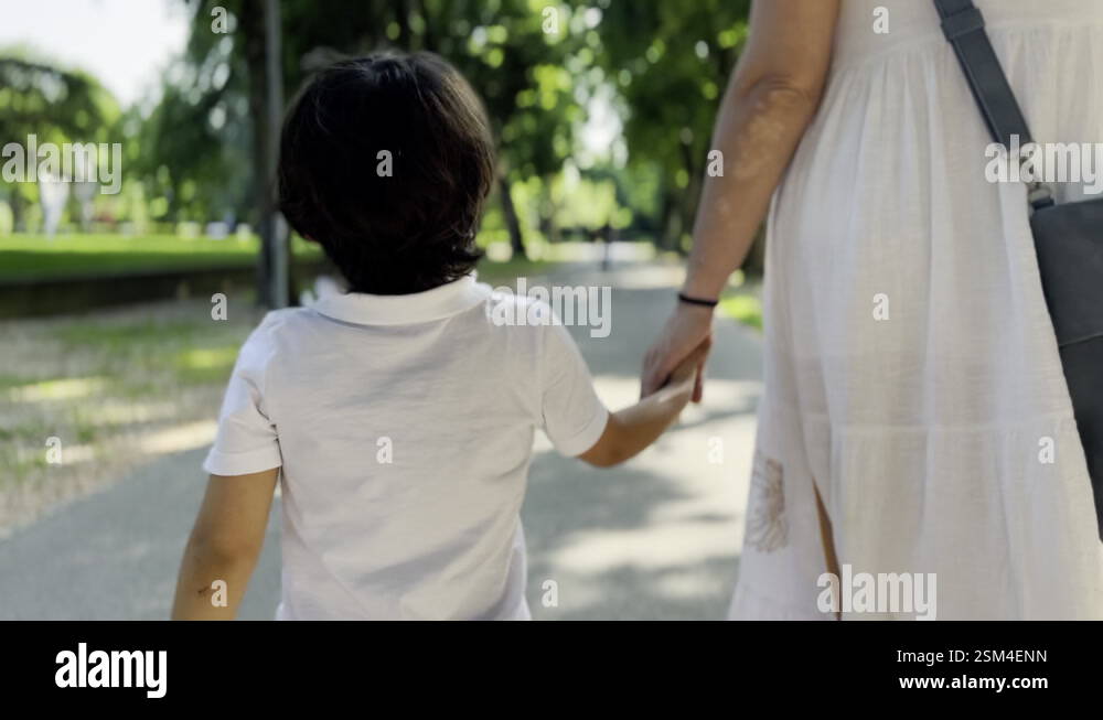 Mother son holding hands back view Stock Videos & Footage - HD and 4K ...