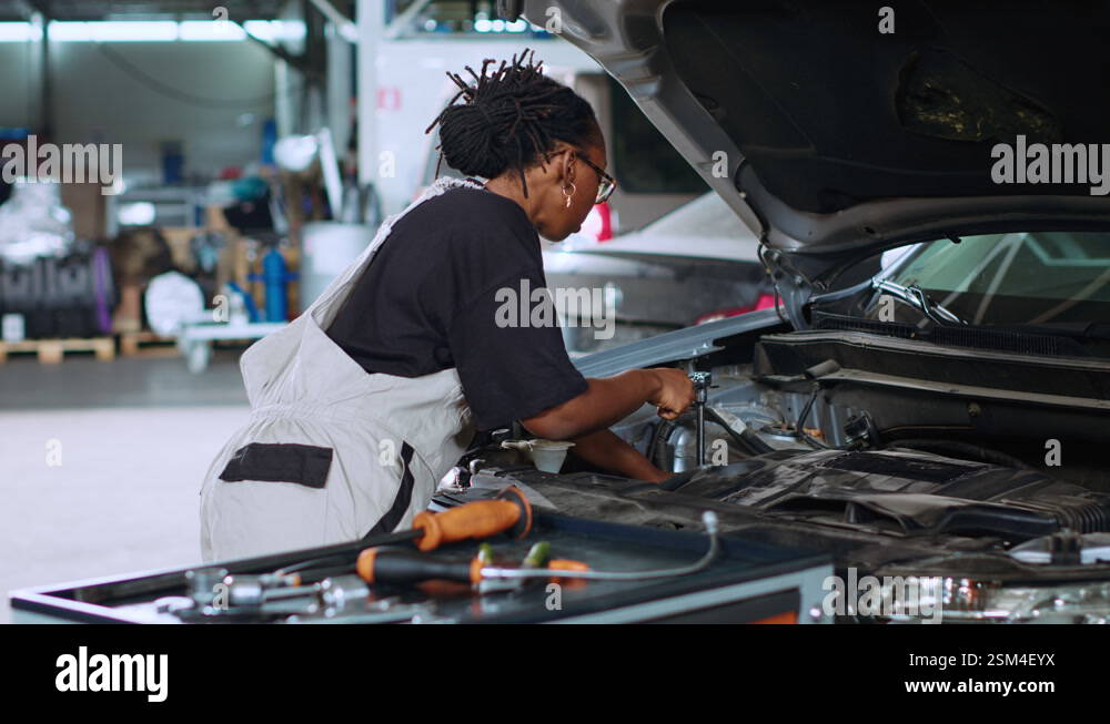 Serviceman In Garage Using Torque Wrench Stock Video Footage Alamy