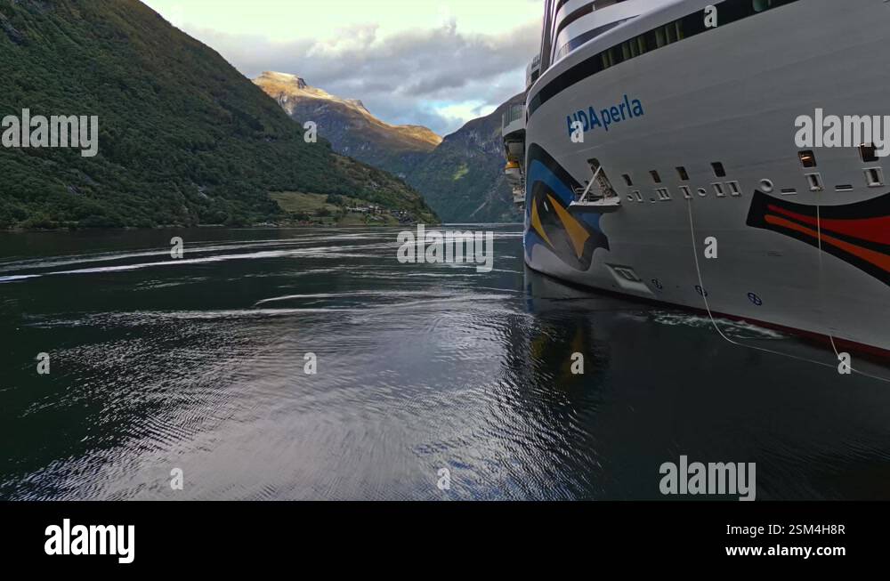 Aerial of a cruise ship from the AIDA line moored of the village of ...