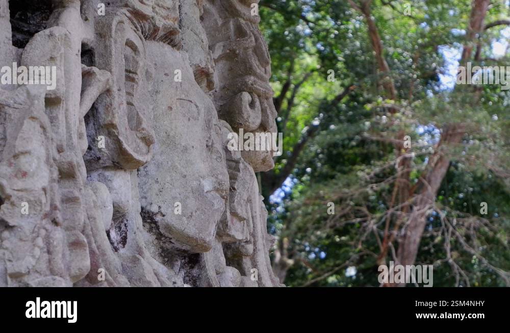 Close detail: Carved stone face of Mayan king at Copan ruin, Honduras ...