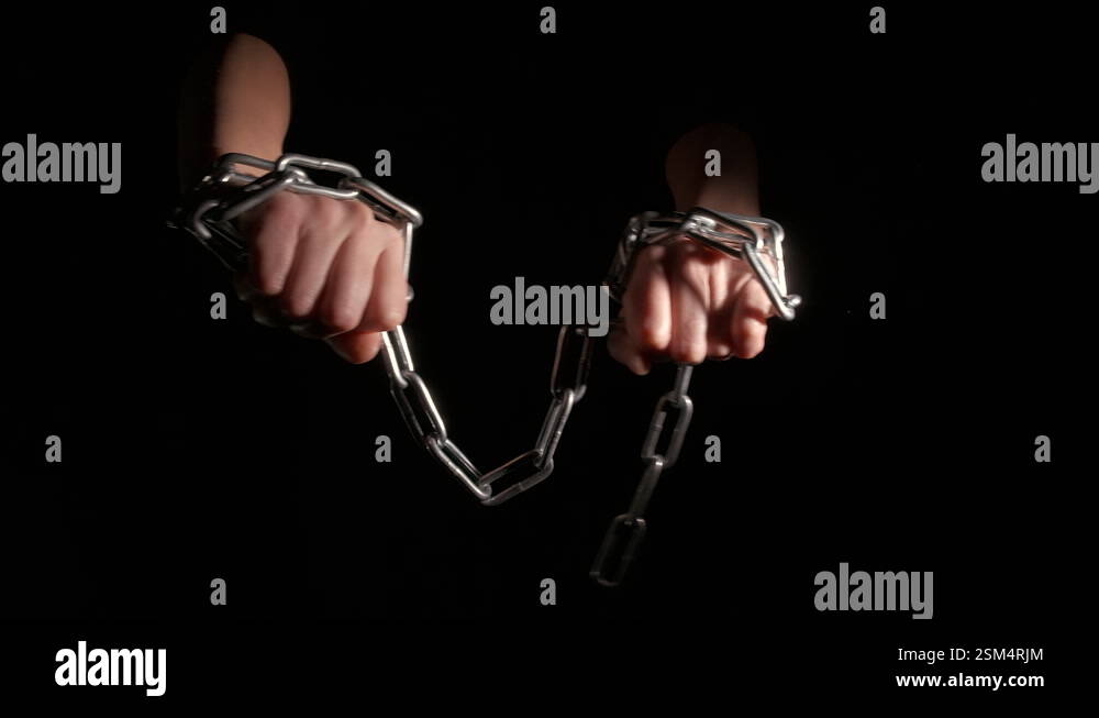 Slavery move with chain Stock Video Footage - Alamy