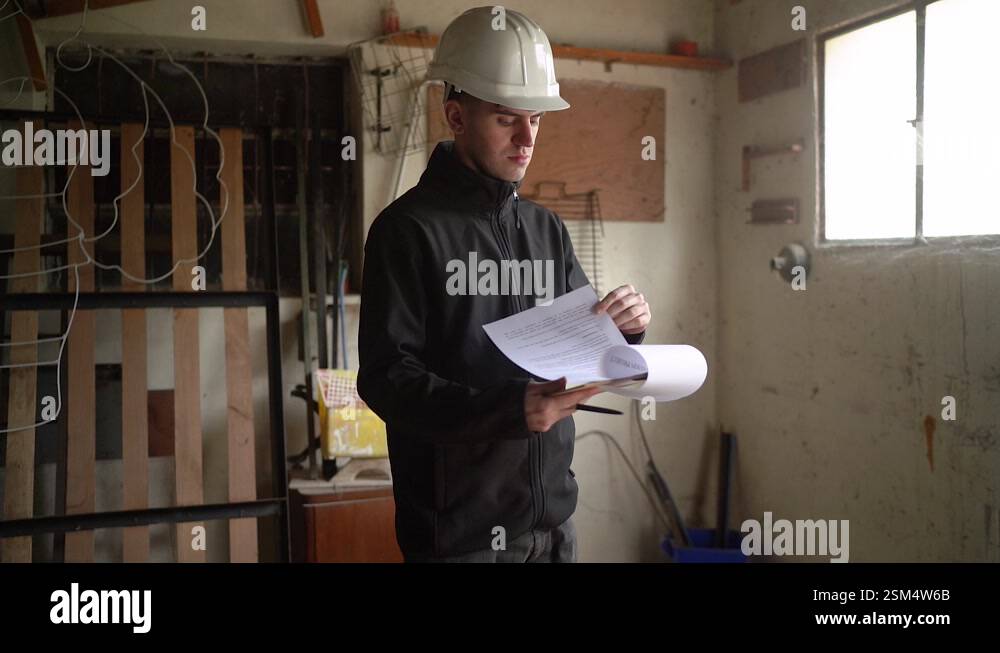 Home Renovation - Young Structural Inspector Reviewing Details For ...