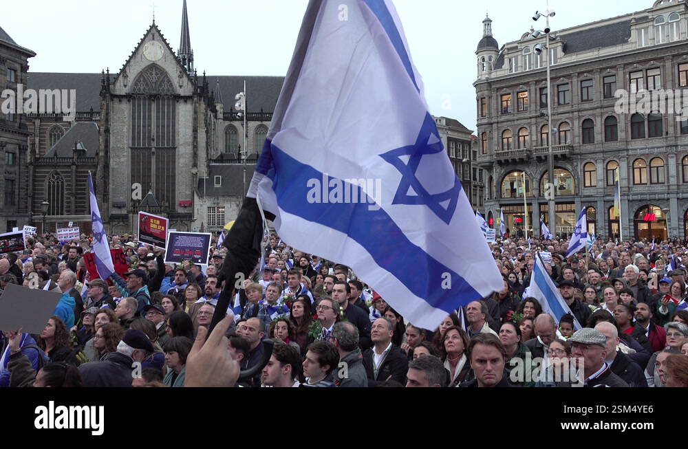 Waving Israeli flag during support protest in Europe, crowds of people ...