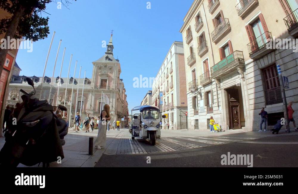 Take a leisurely stroll down the iconic Gran Via, Madrid's bustling ...