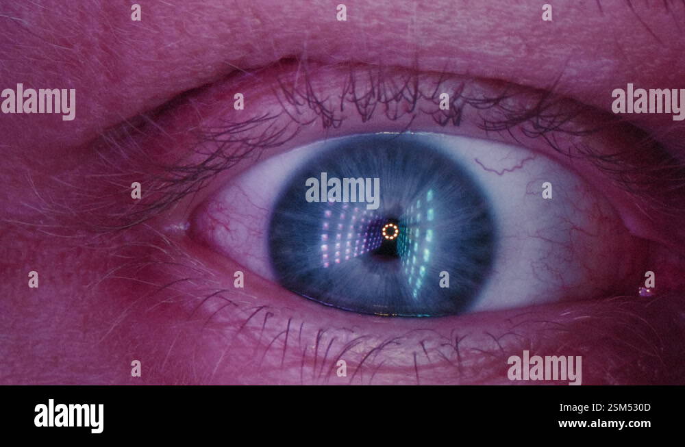 Scary and terrible human eye. The blue pupil is surrounded by veins and ...