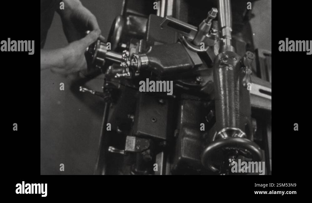 1950s: Person makes adjustment on lathe. Tool is used to measure ...
